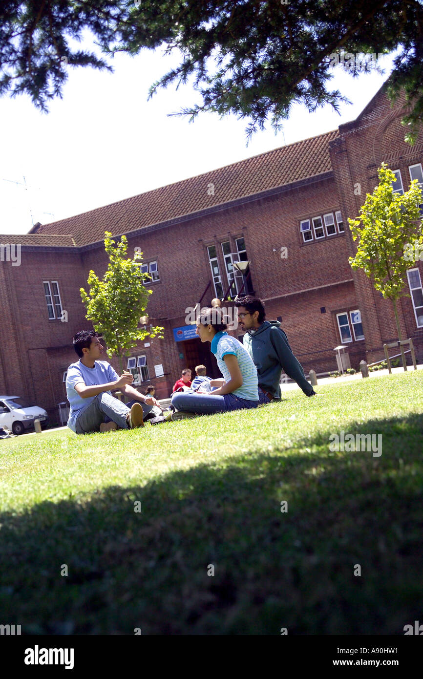 Education students relaxing on campus Stock Photo - Alamy