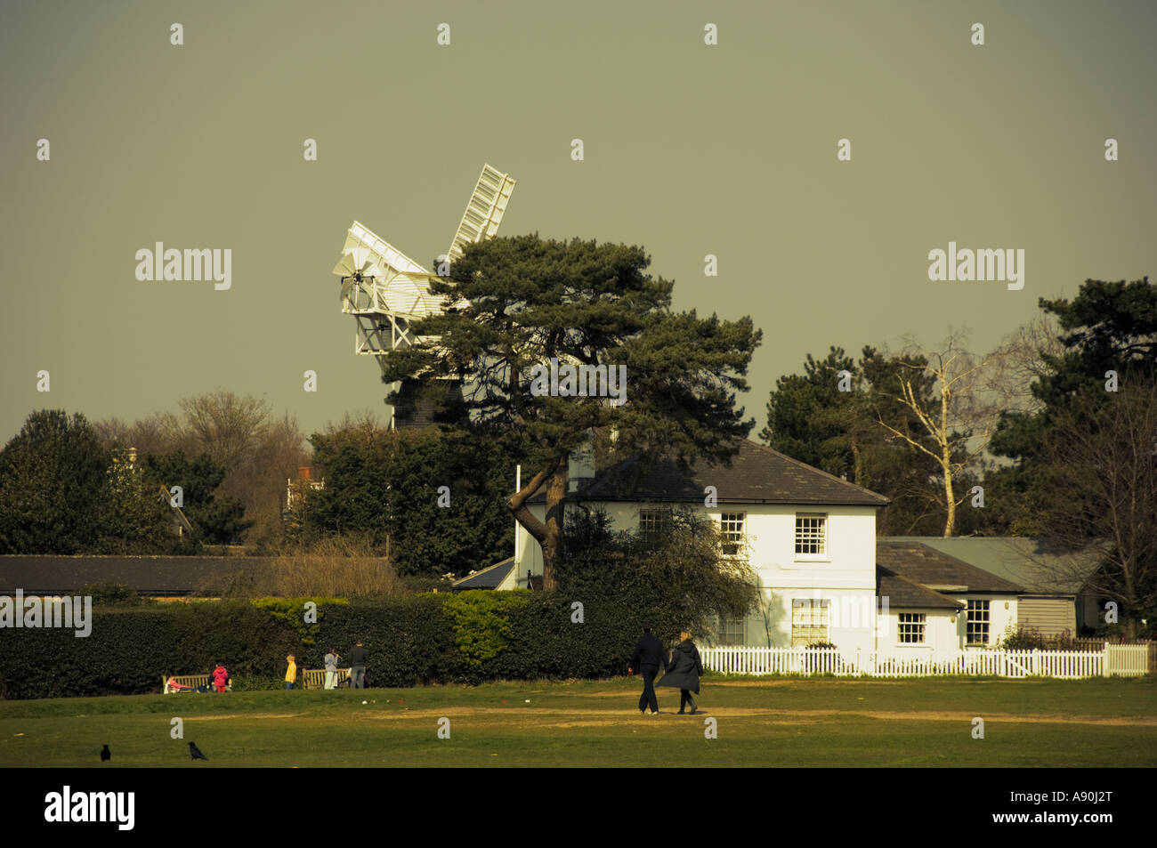 Cottage and windmill, Wimbledon Common, London, England Stock Photo - Alamy