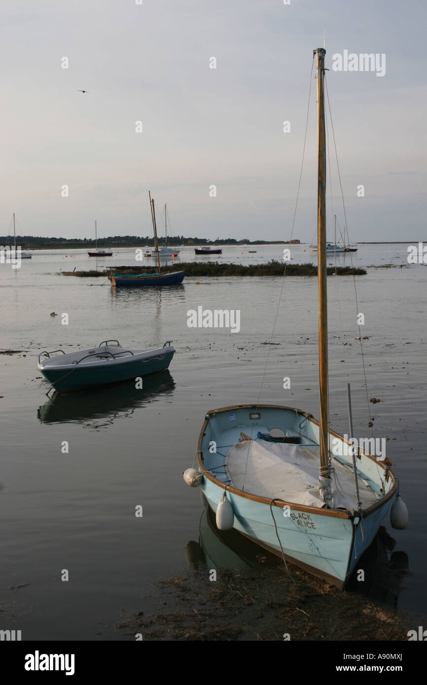 Blue Boat & High Tide Stock Photo - Alamy
