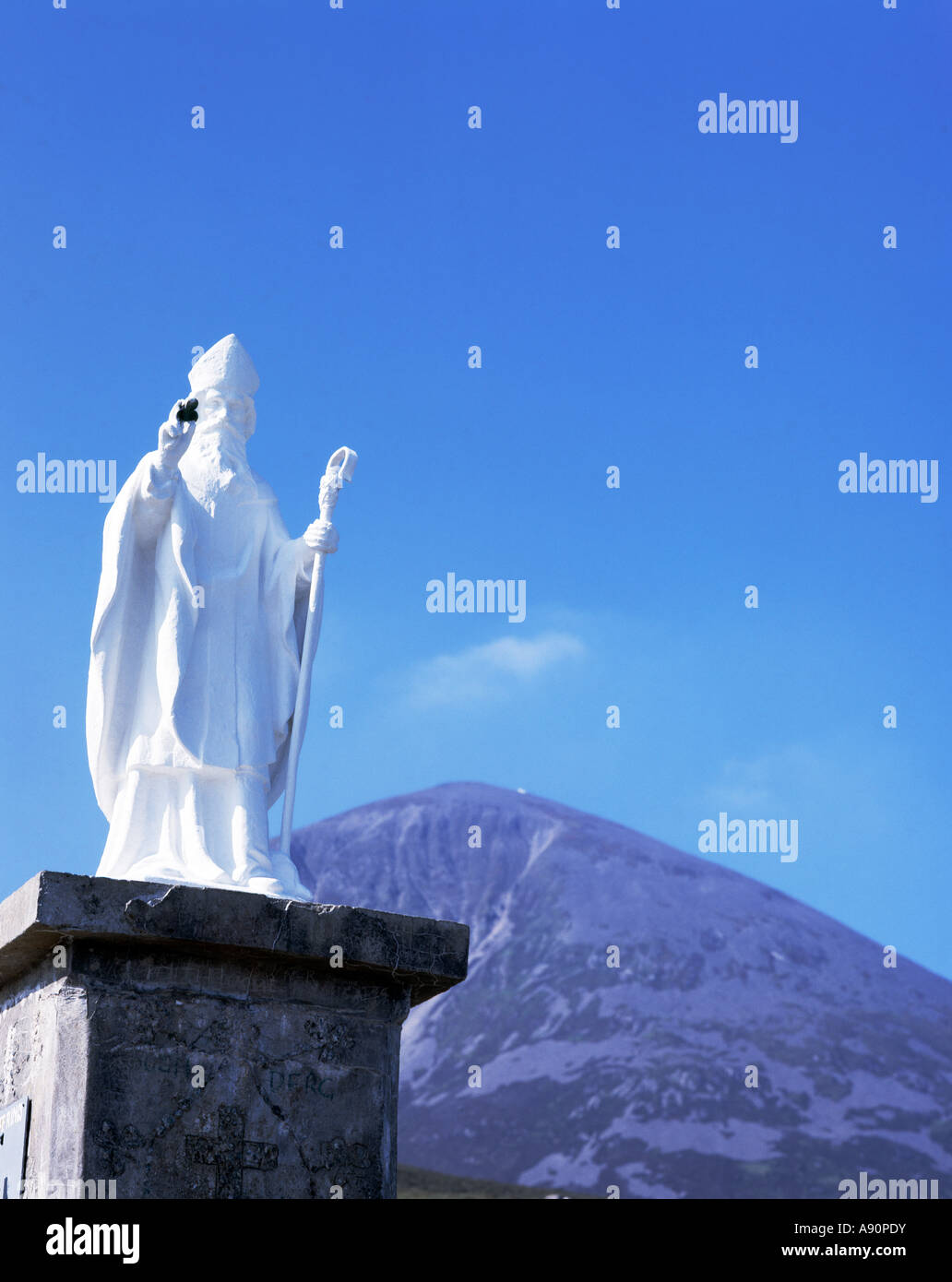 large white statue of st patrick against sacred mountain called after ...