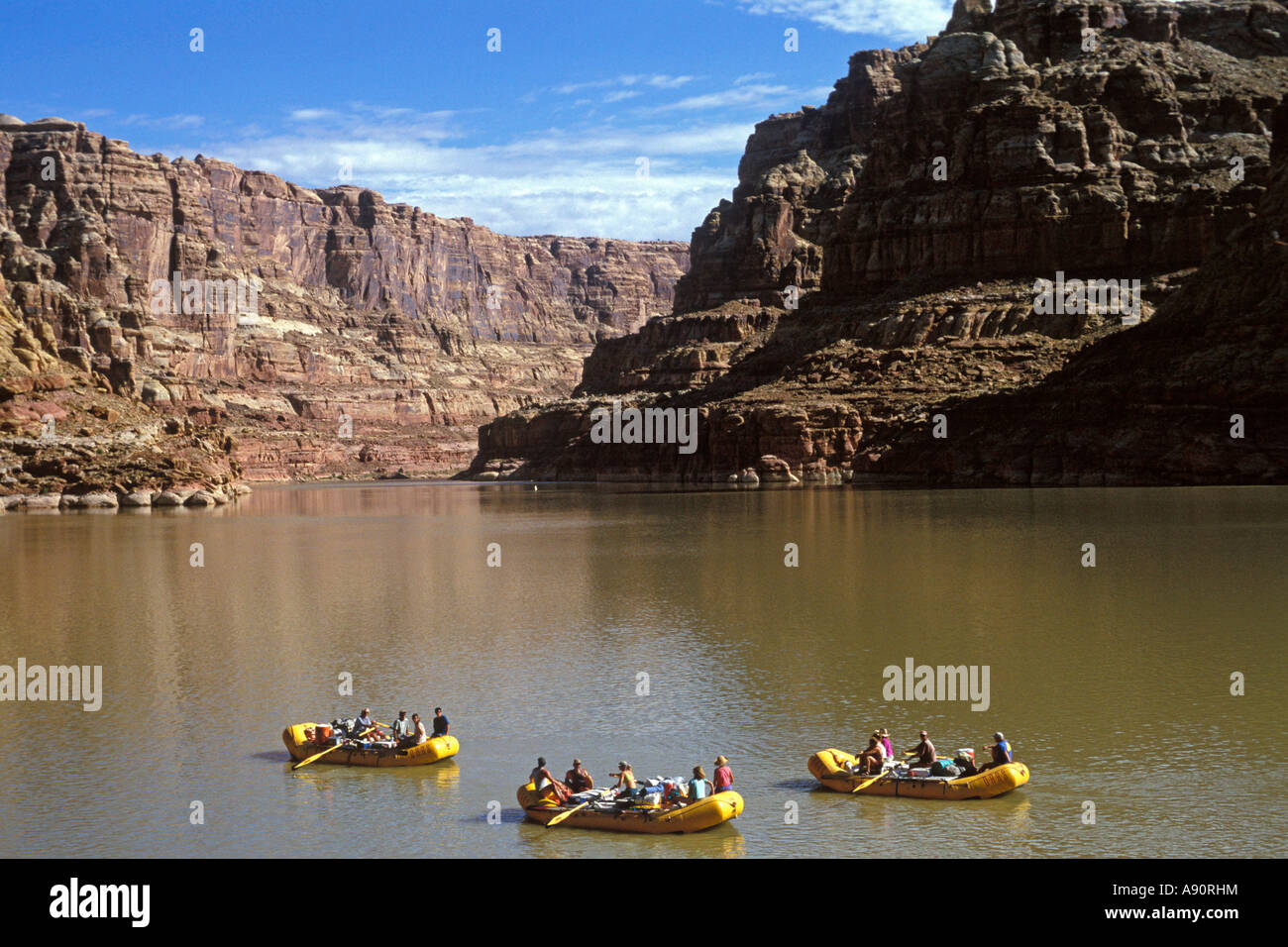Three groups rafting on the Colorado River Cataract Canyon Utah USA ...