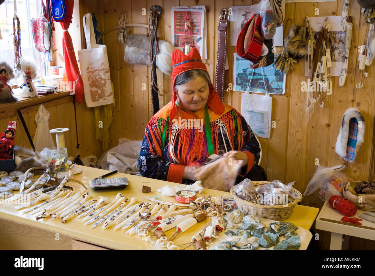 Saami crafts being handmade at Honningsvag Norway Stock Photo - Alamy