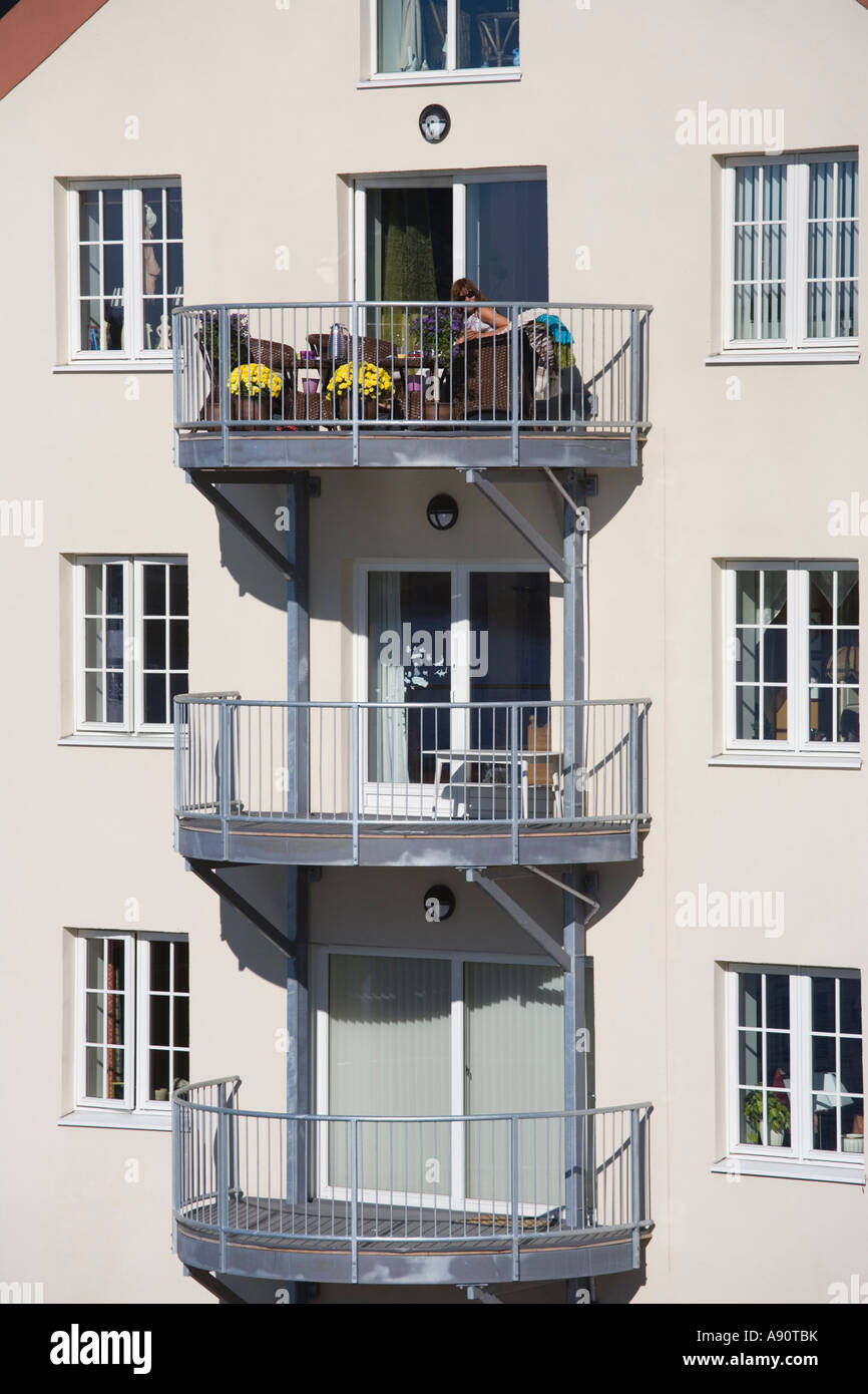 Enjoying breakfast on a balcony at apartments beside the harbour at ...