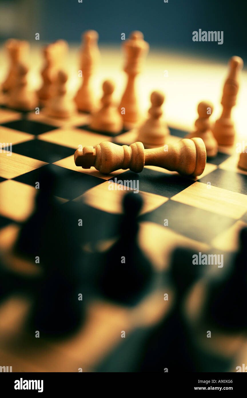 Chess board with white King resigned Stock Photo - Alamy