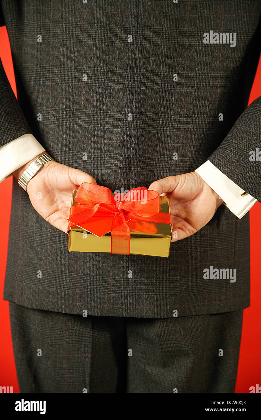 Hiding a gift Stock Photo - Alamy