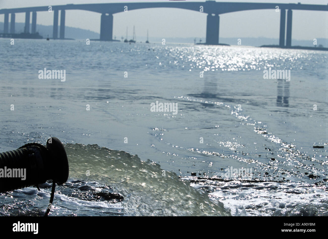Flooded water being pumped back into the river Orwell, Ipswich, Suffolk ...