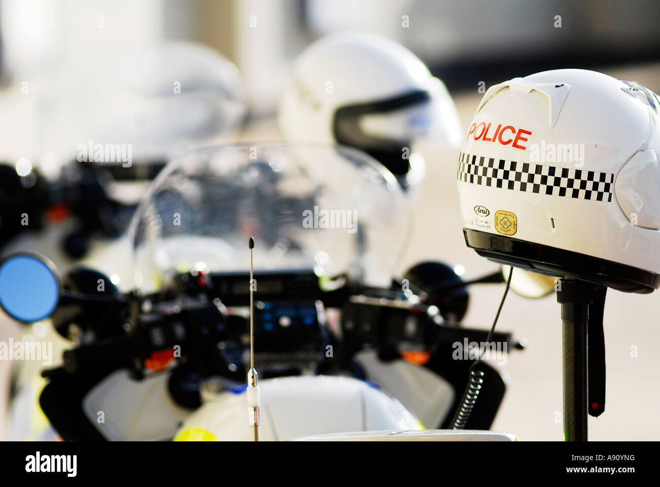 Police motorcycle riders helmets Stock Photo - Alamy
