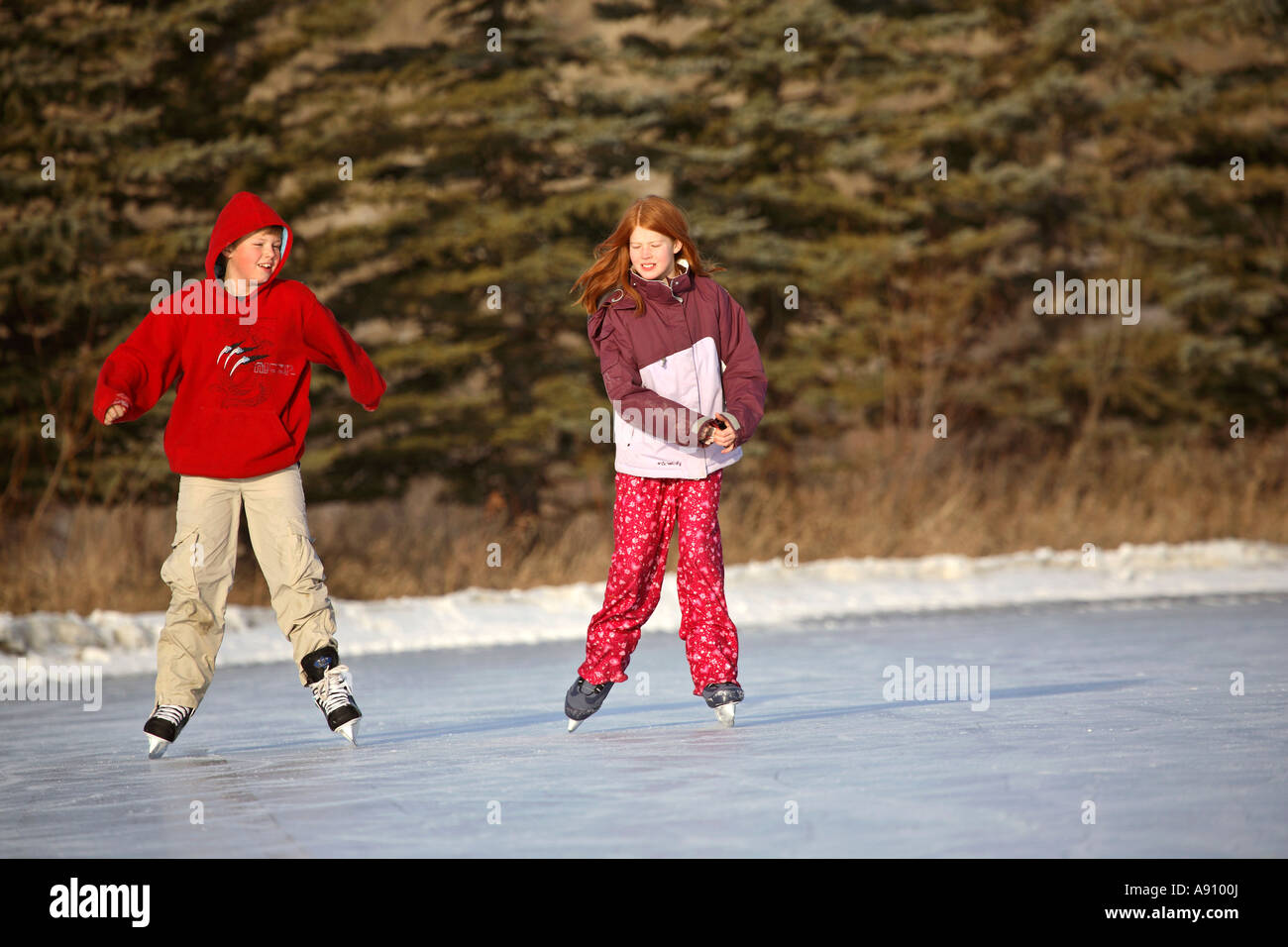 Boy skating on outdoor ice in moose jaw hi-res stock photography and ...