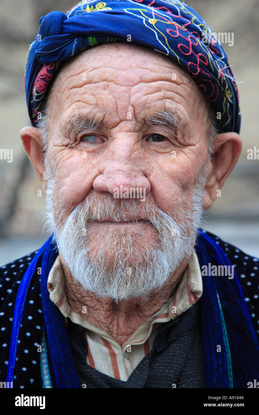 Uzbek man suffering from cataract, with traditional dress, Uzbekistan ...