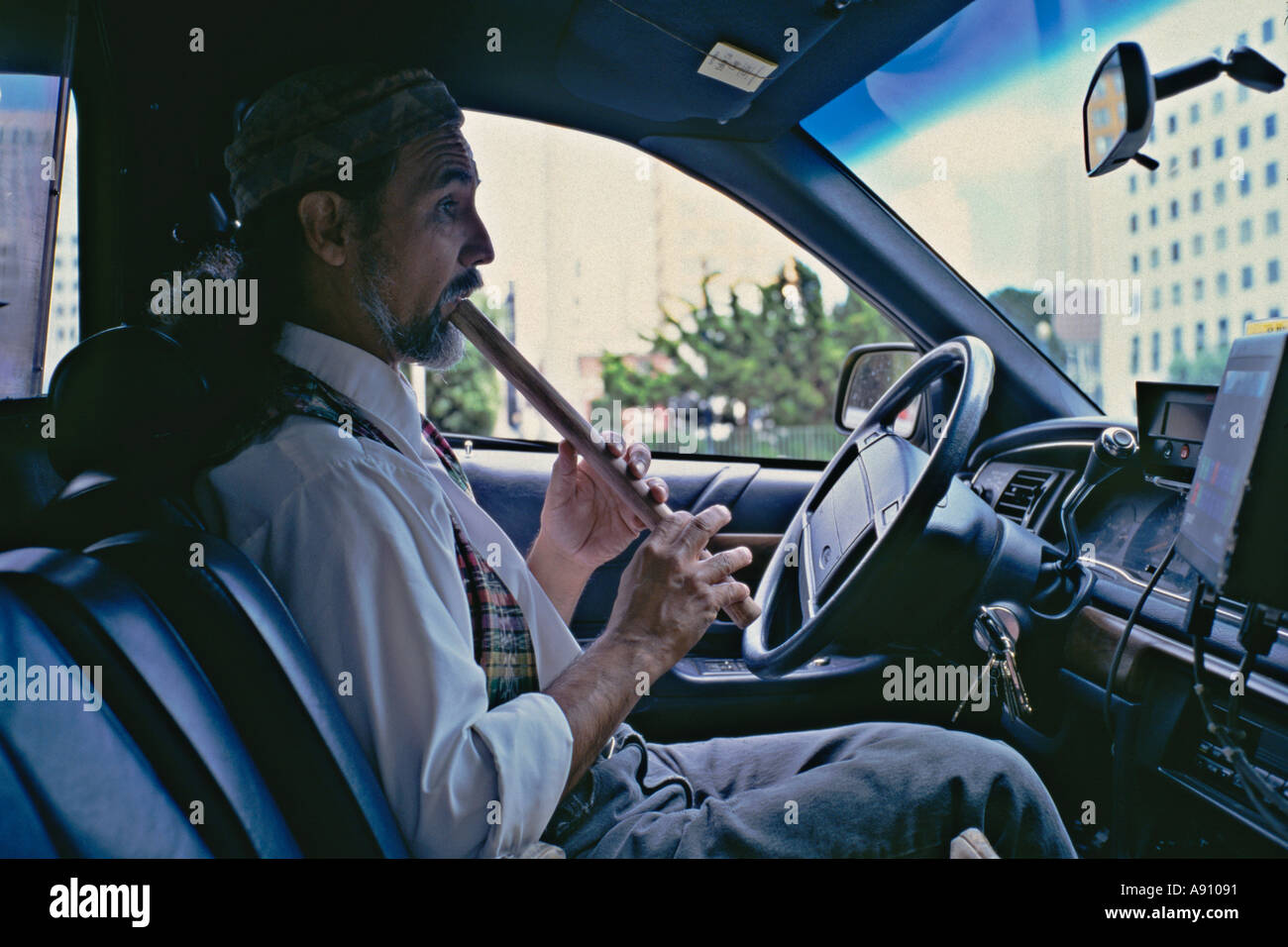 Taxi Driver Plays The Kena An Inca Flute While Waiting For Next Fare ...