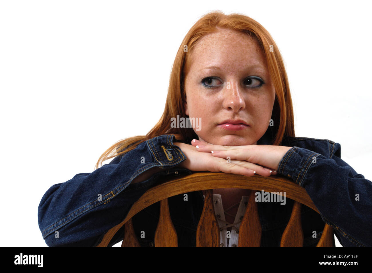Young woman leaning on hands Stock Photo - Alamy