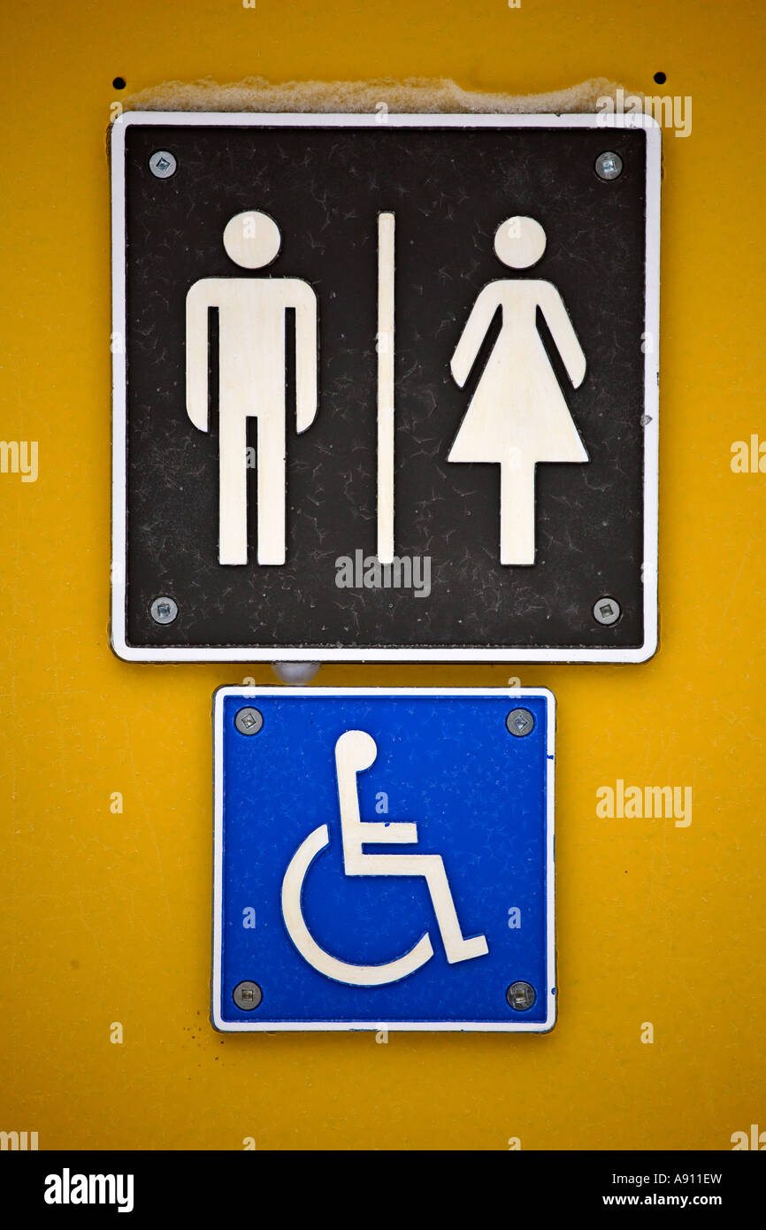 Signs on outdoor toilet Stock Photo - Alamy
