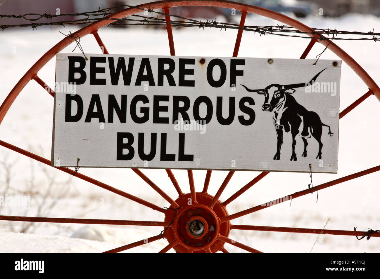 Comical sign at Manitoba farm entrance Stock Photo - Alamy