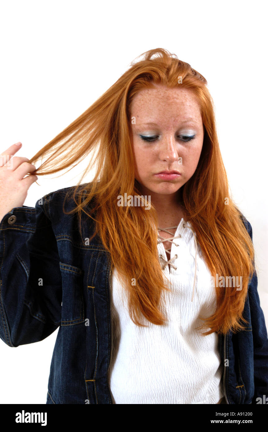 Young woman pulling hair Stock Photo - Alamy