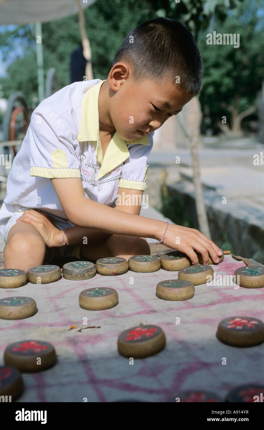 Boy playing Chinese Checkers, Beijing, China Stock Photo - Alamy