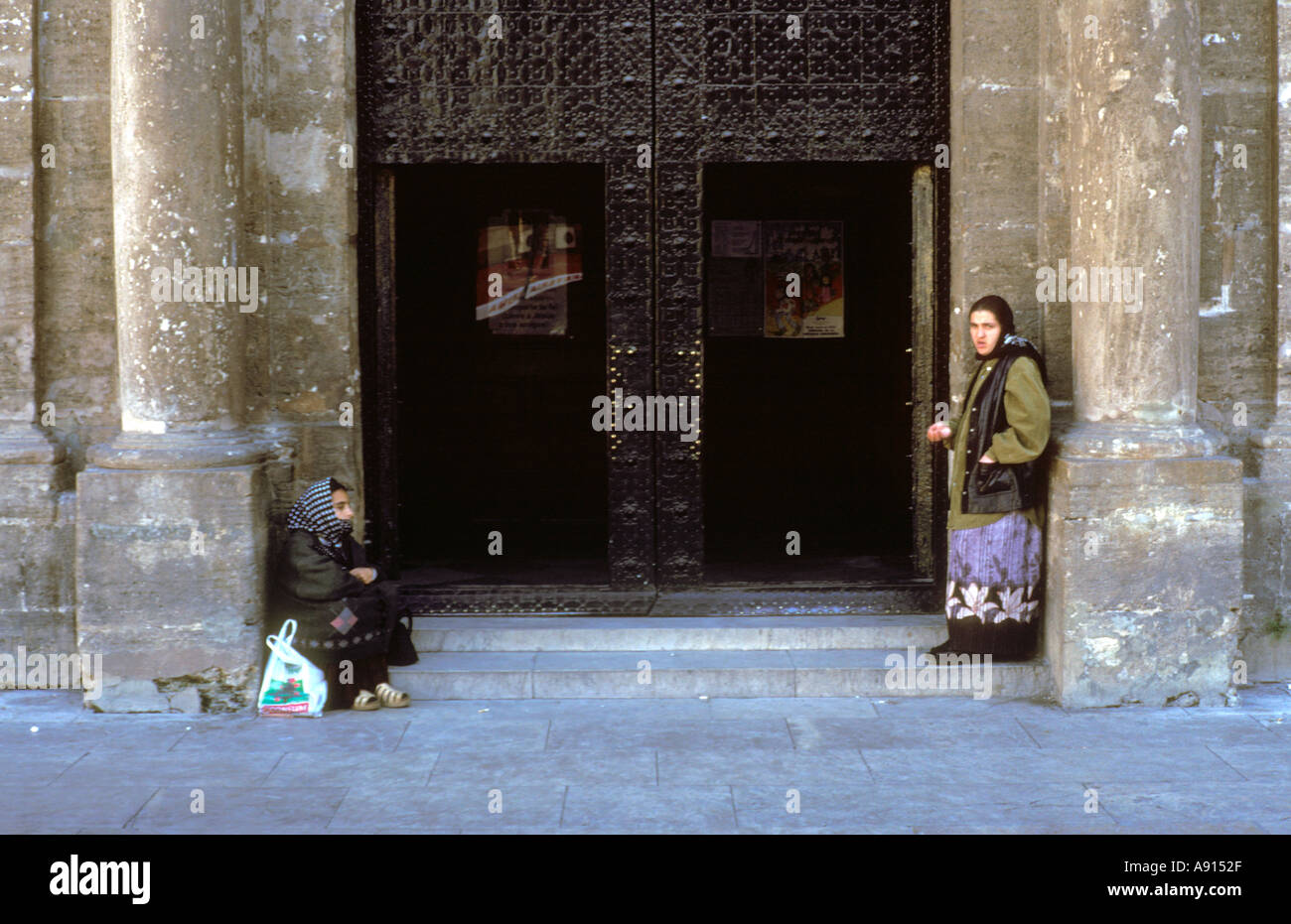 Beggars outside basilia door LOCATION Basilica Pl Virgen Valencia Spain ...