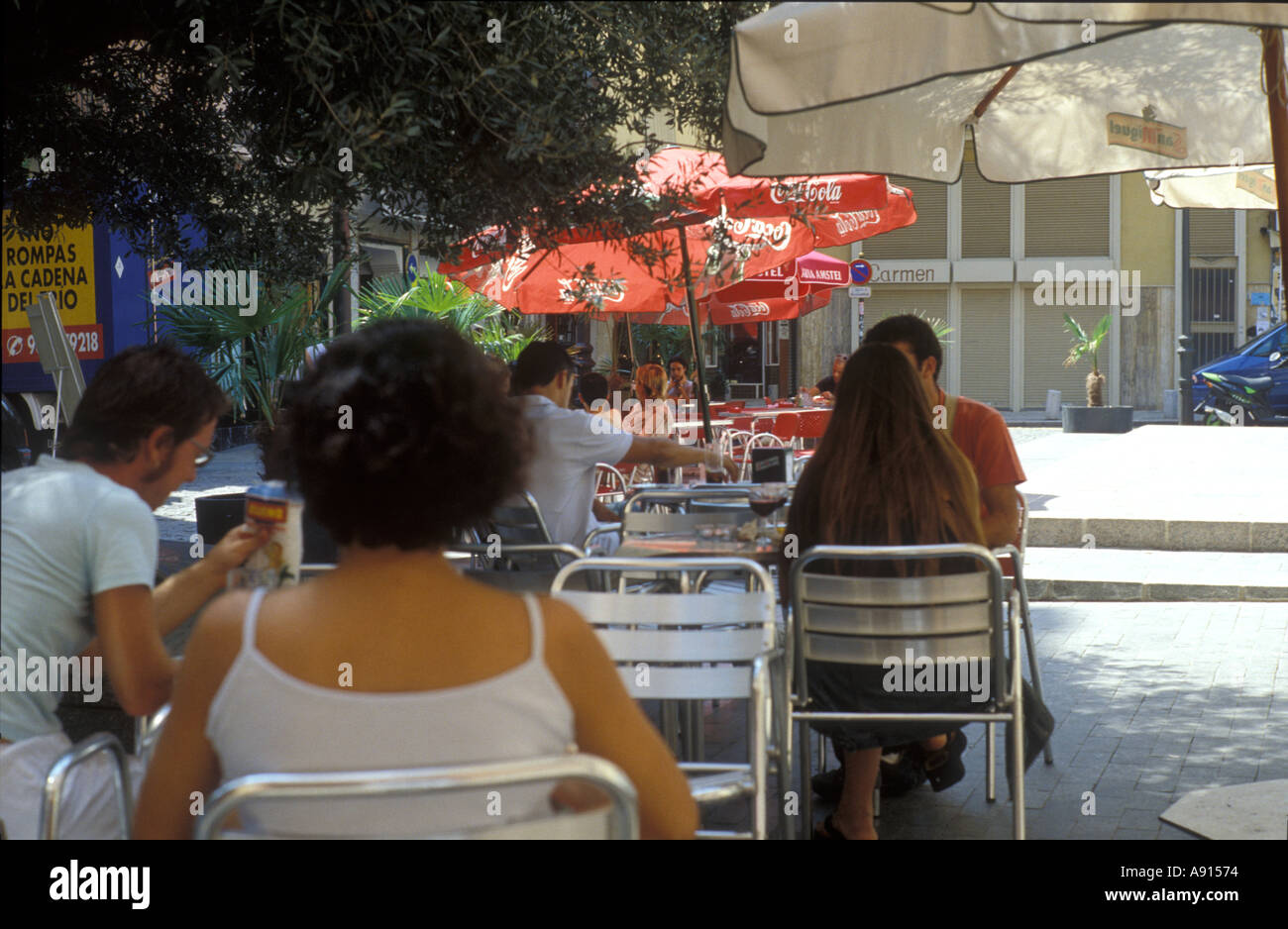 People sitting outside Bar El Kiosko summer LOCATION Pla Dr Collado ...