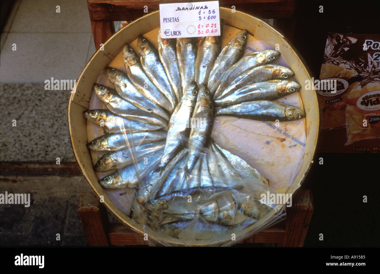 Salted sardines in box pesetas euros sign LOCATION Barrio Mercado ...