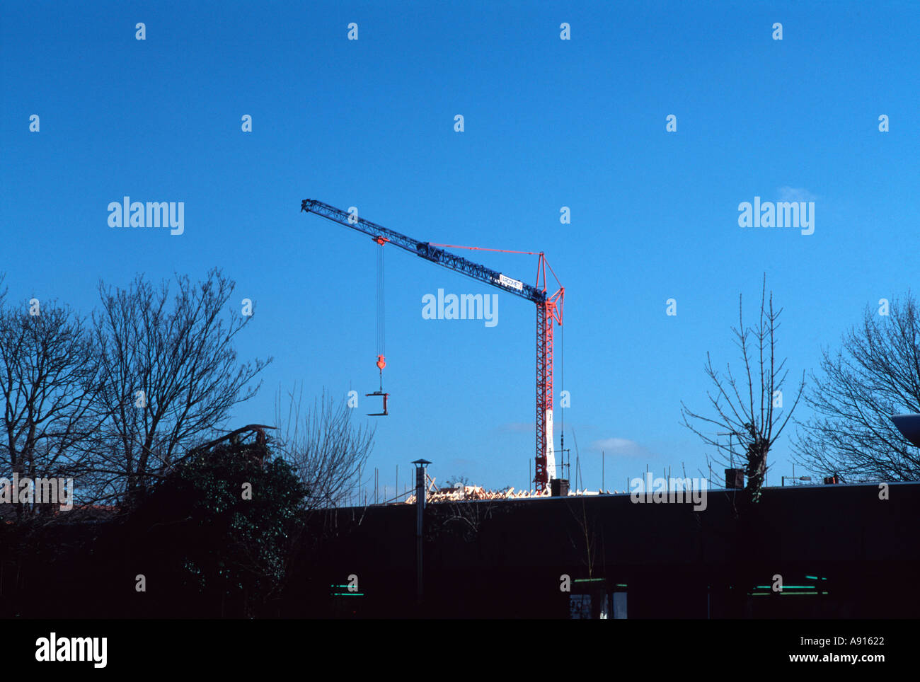 Crane on building site Stock Photo - Alamy