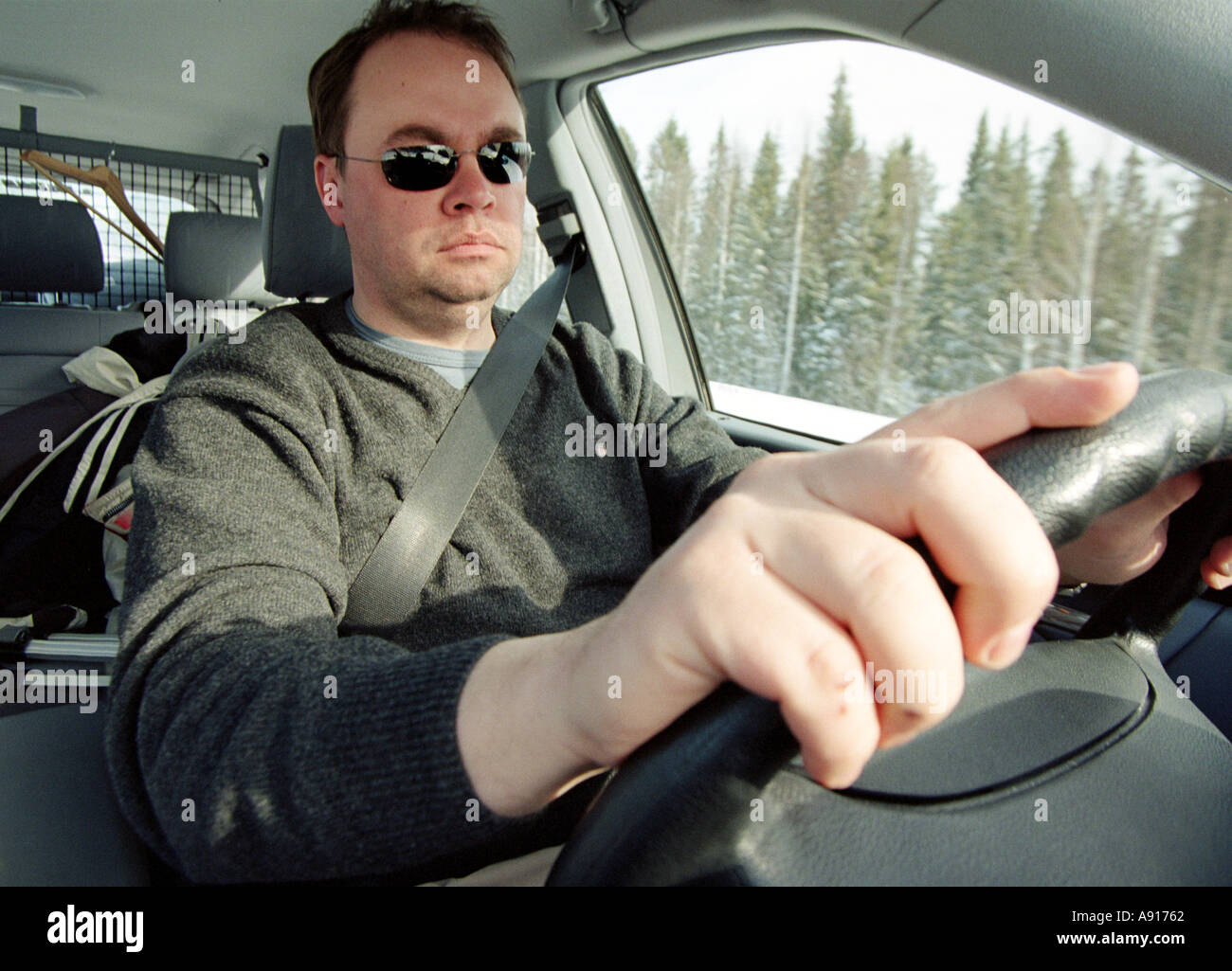 Man driving car Stock Photo - Alamy