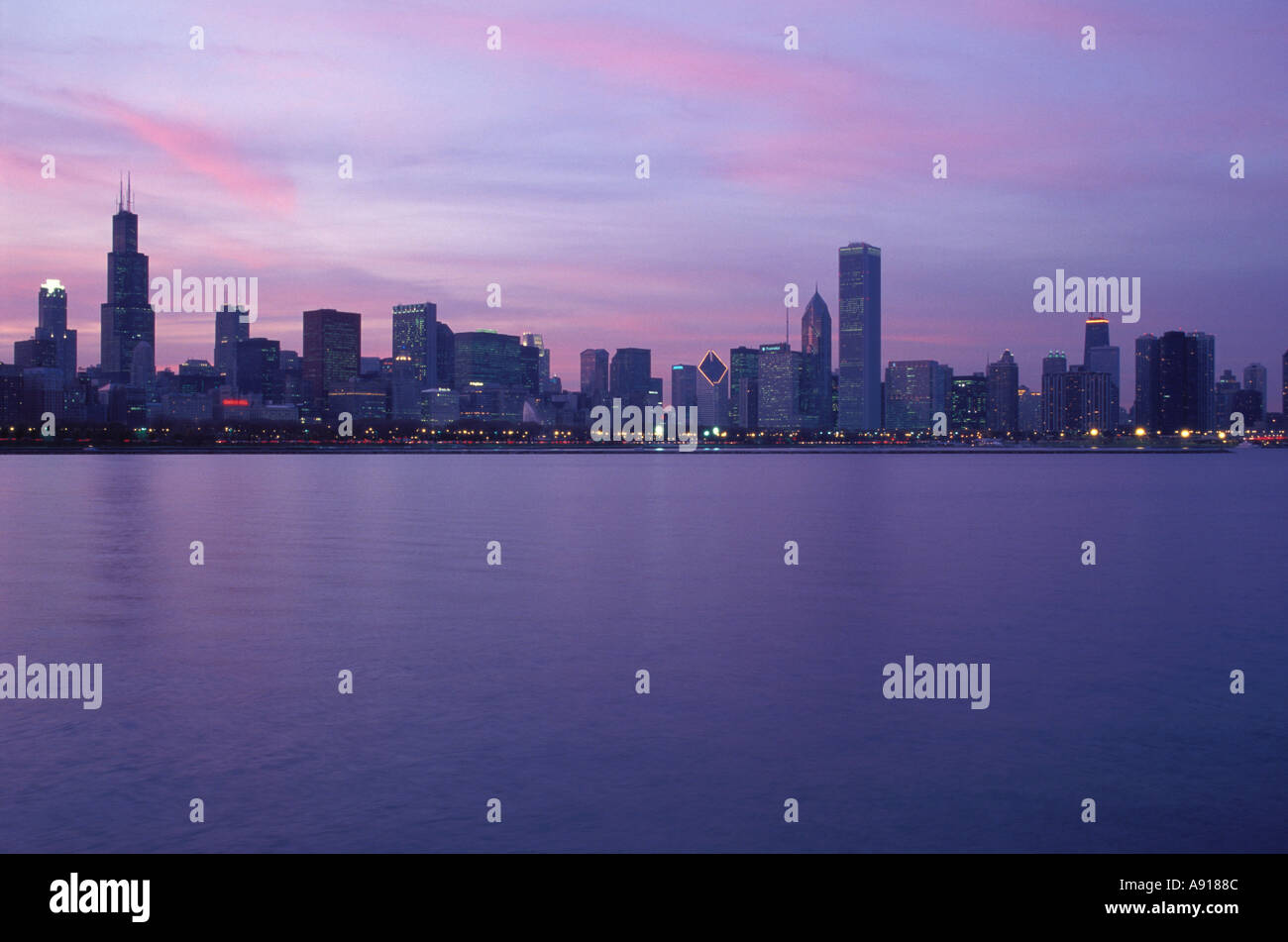 Chicago skyline reflecting in Lake Michigan Illinois Stock Photo - Alamy