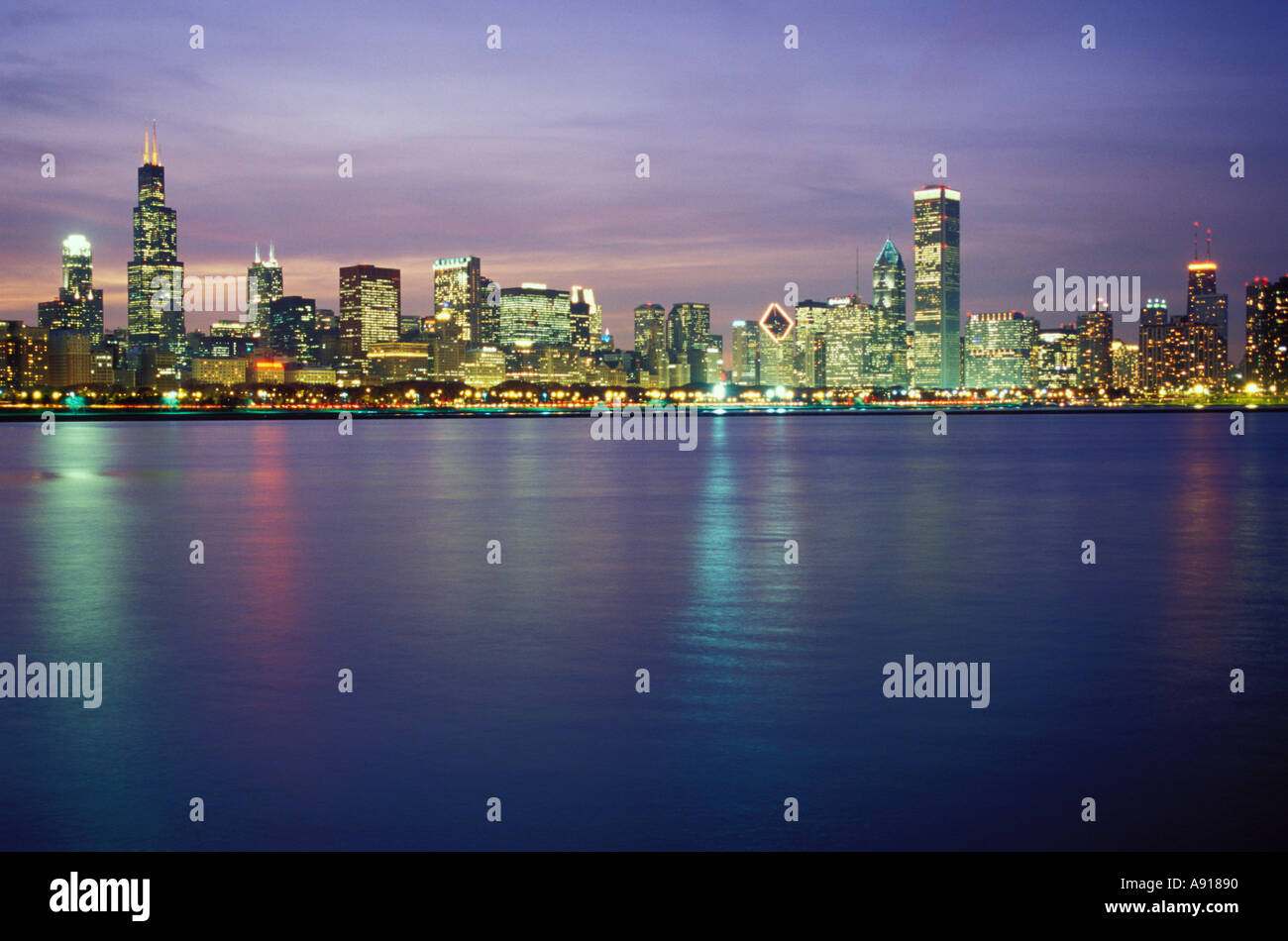 Chicago skyline reflecting in Lake Michigan Illinois Stock Photo - Alamy