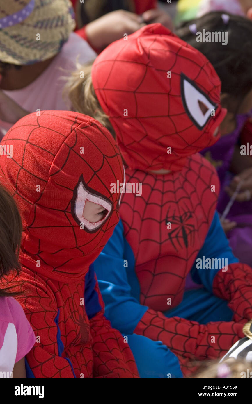 Two children dressed as Spiderman at school fete Stock Photo - Alamy