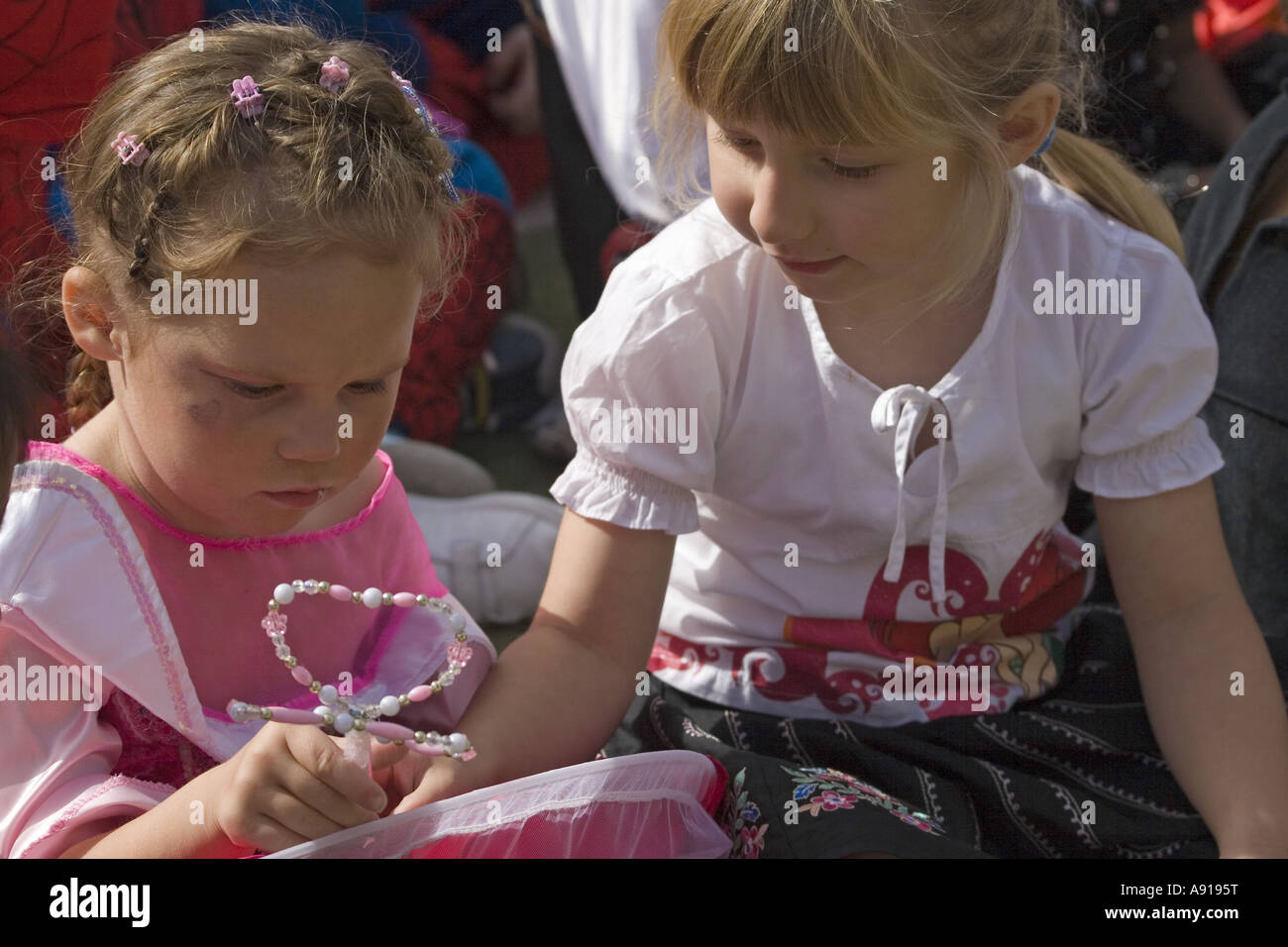 School fancy dress fete fun day two girls Stock Photo - Alamy