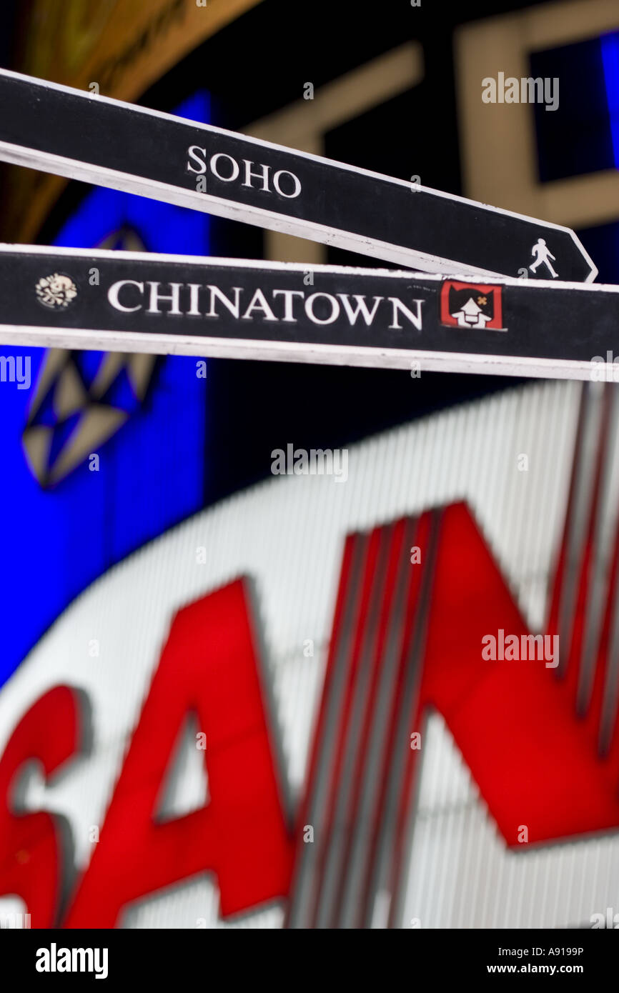 Neon sign in Piccadilly square London UK with Soho and Chinatown street ...