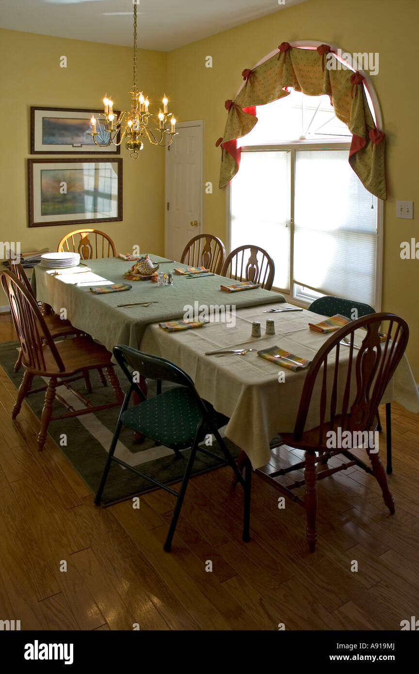 Dining Dinner Table near Window Stock Photo - Alamy