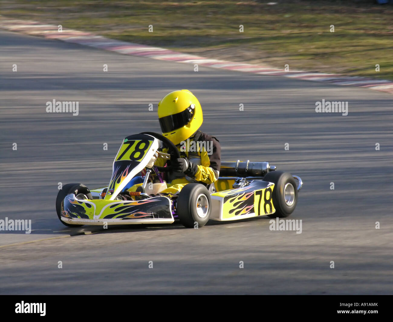 A racing yellow and black cadet go kart Stock Photo - Alamy