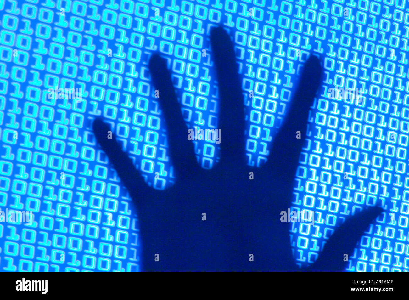 silhouette of a hand composited on binary code screen Stock Photo - Alamy