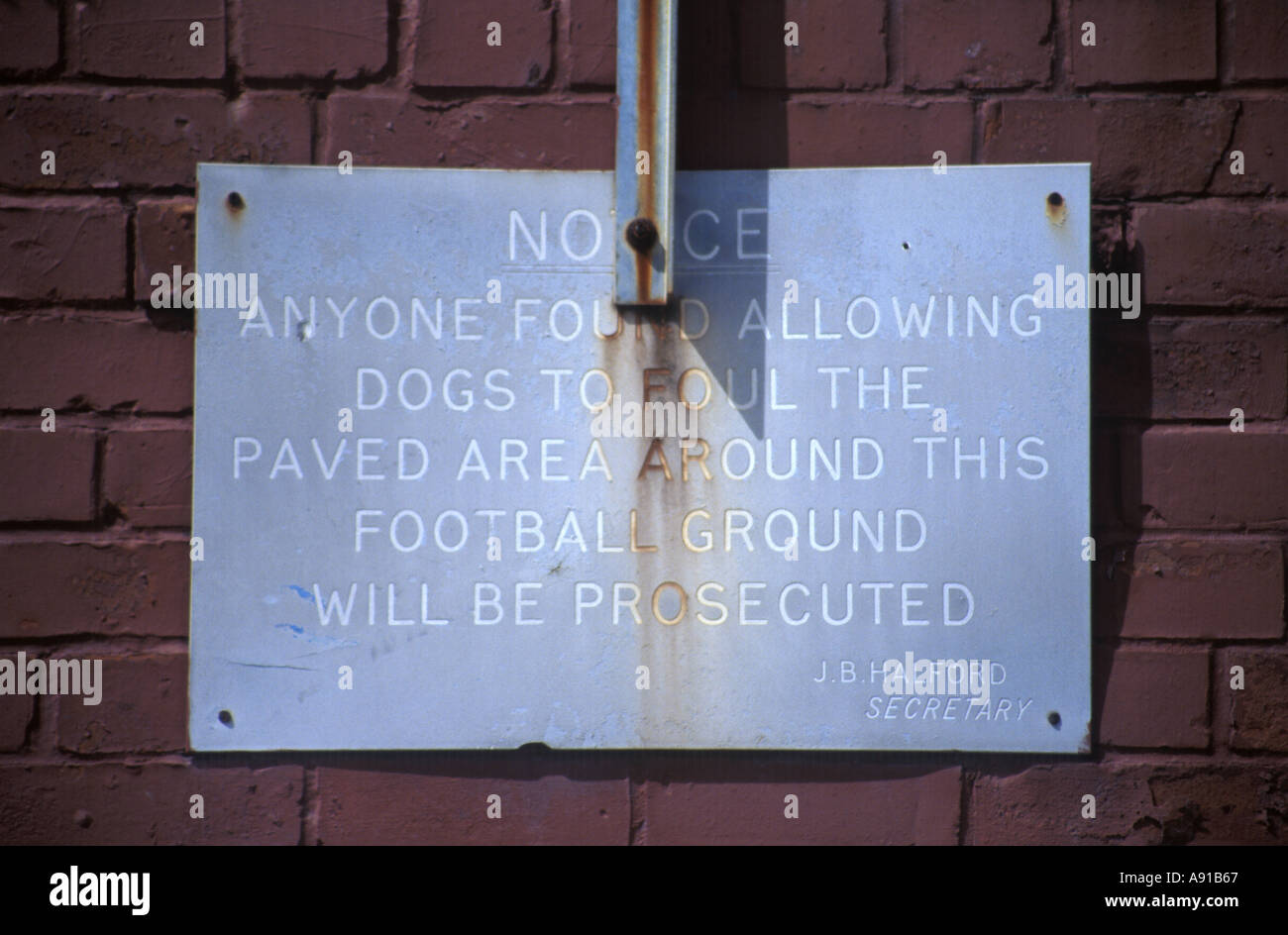 Sign on exterior wall outside the Kippax stand Manchester City Football ...
