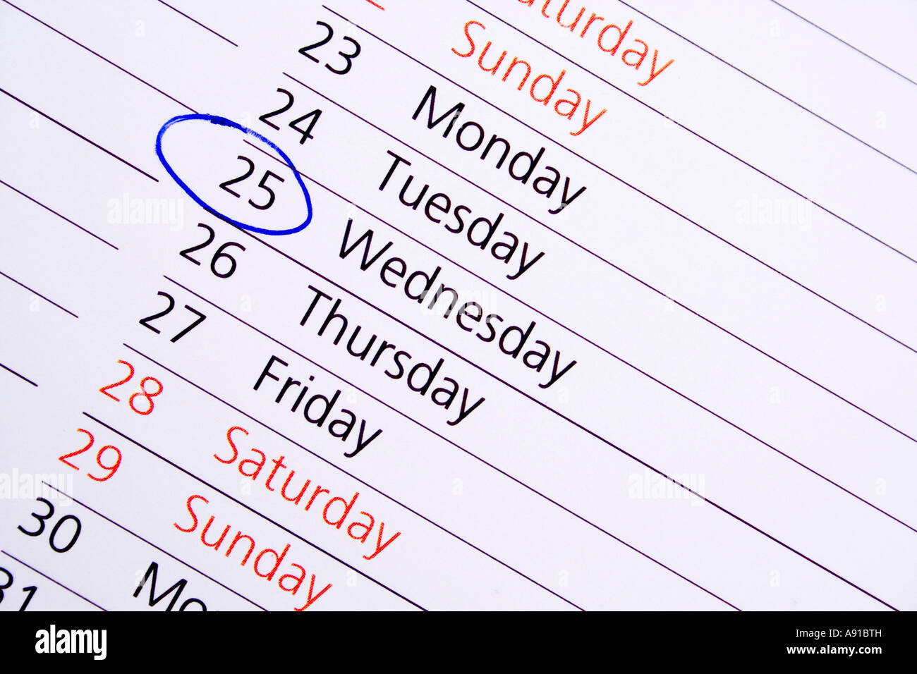 Close up of a calendar with a date ringed. This diary has a specific ...