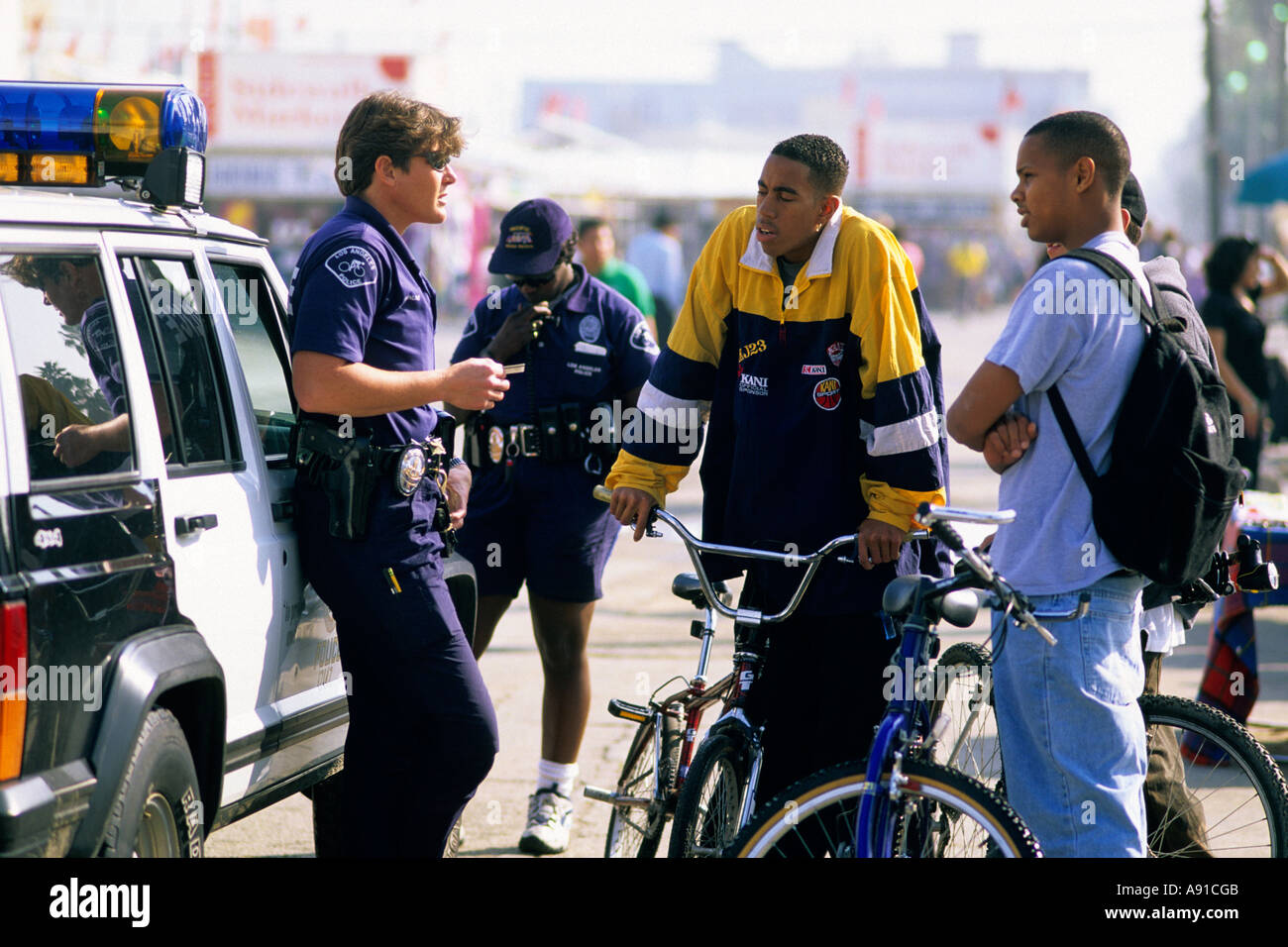 Police and teens on bicycle in Venice, California Stock Photo - Alamy