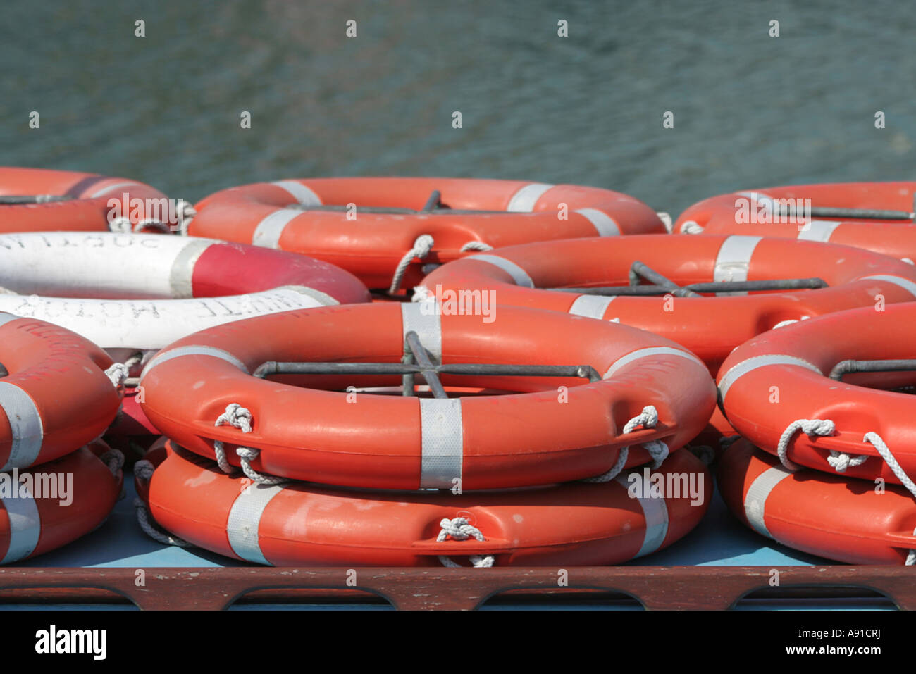Orange safety belts hi-res stock photography and images - Alamy
