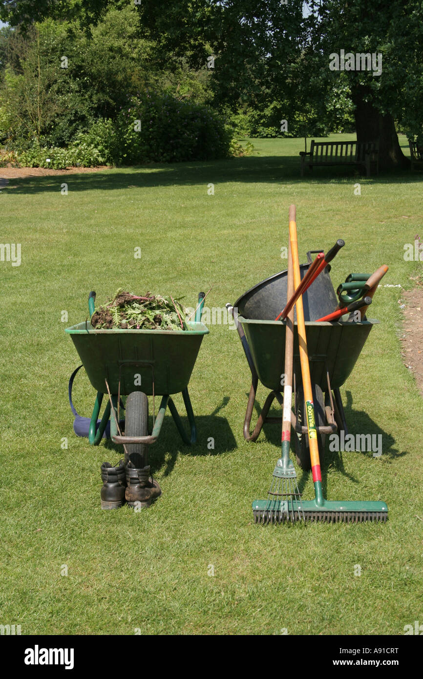 A variety of gardening tools in two wheel barrows Stock Photo - Alamy