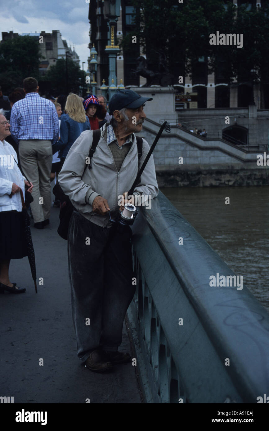 Man fishing off Westminster Bridge London Stock Photo - Alamy
