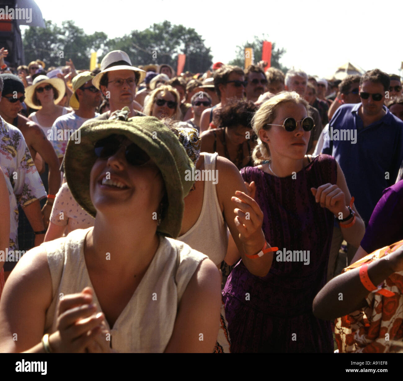 Crowd dancing at a WOMAD concert UK Stock Photo - Alamy