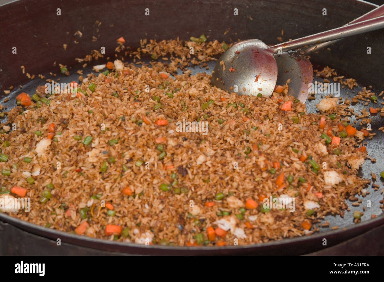 fried rice being prepared by a malaysian hawker Stock Photo - Alamy