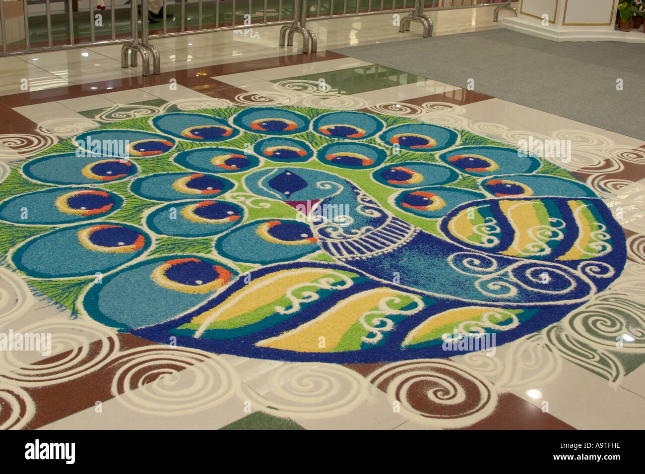 kolam - decorative artwork drawn on floor by south indians using rice ...