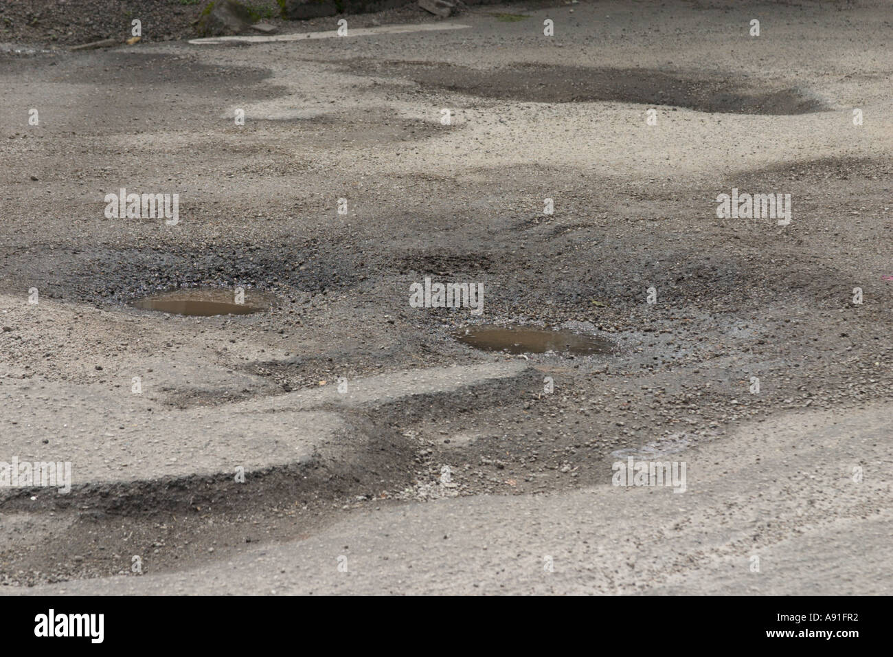 dangerous potholes on a road. concept danger, hazard, pitfalls Stock ...