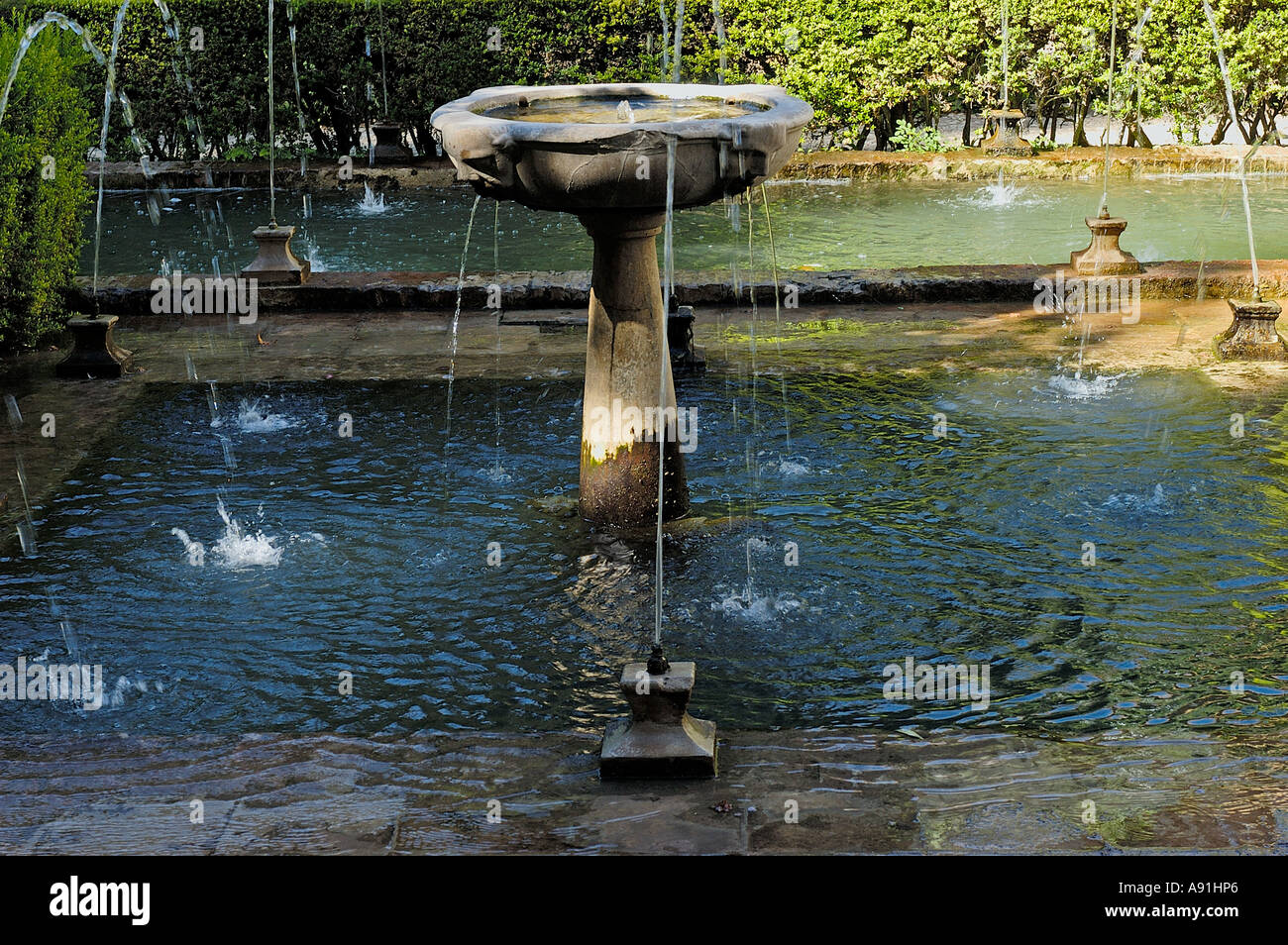 Arabic fountain in Generalife Palace, La Alhambra, Granada province ...