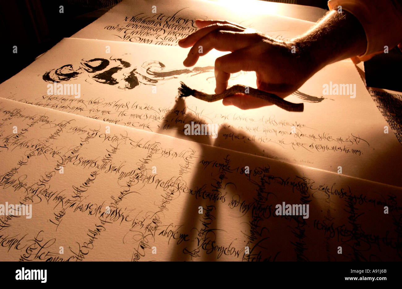 Calligraphy performed by a master craftsman and artist with oriental ...