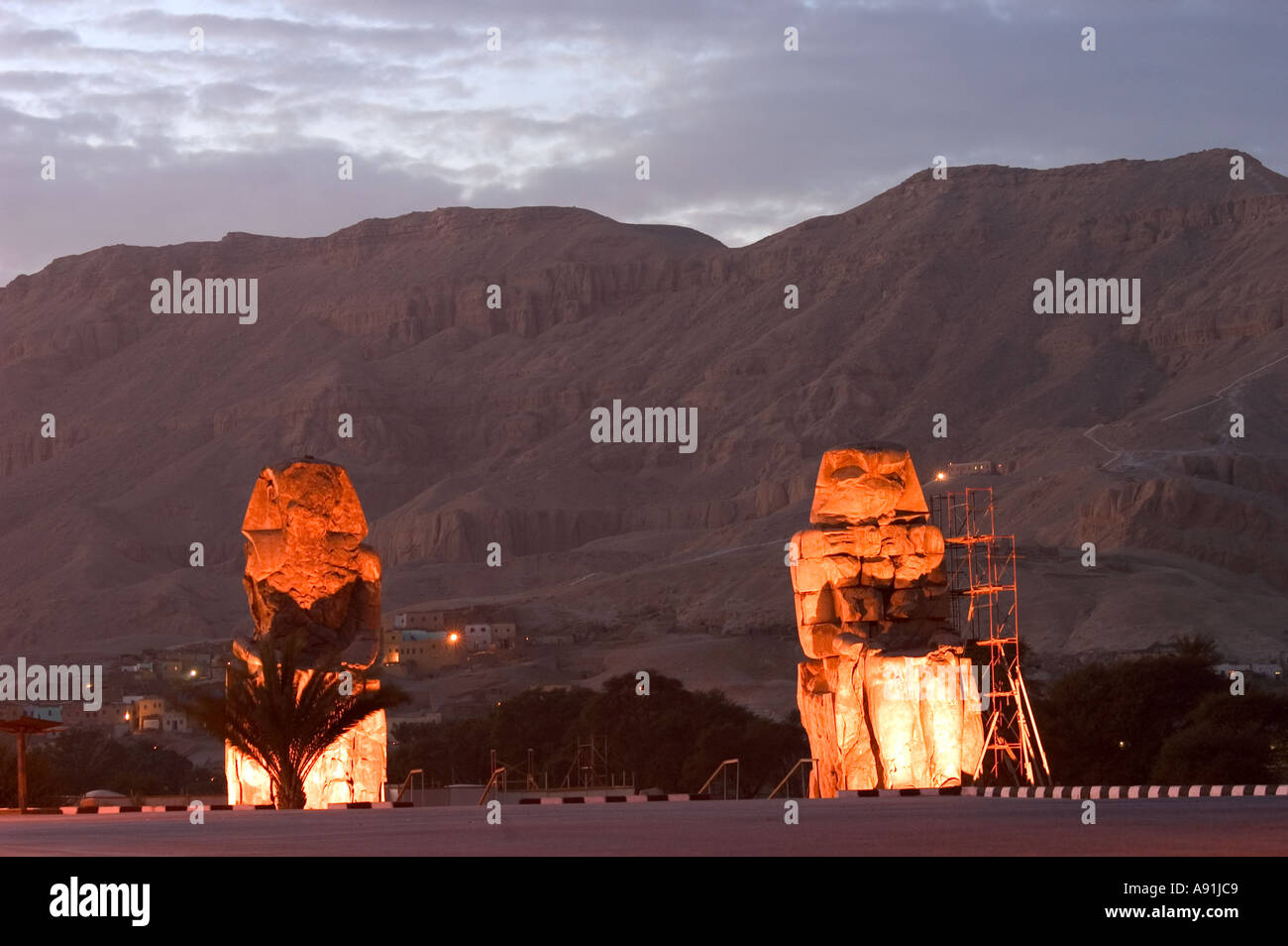 sunset Colossi of Memnon West Bank Luxor Upper Egypt Egypt North Africa ...