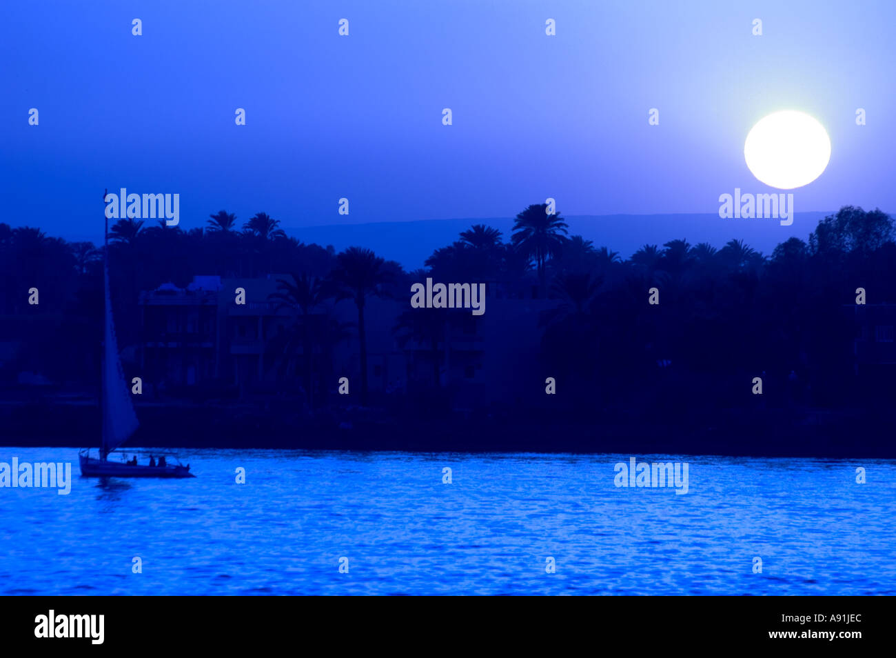 sunset felucca boats Nile River Luxor Upper Egypt Egypt North Africa ...