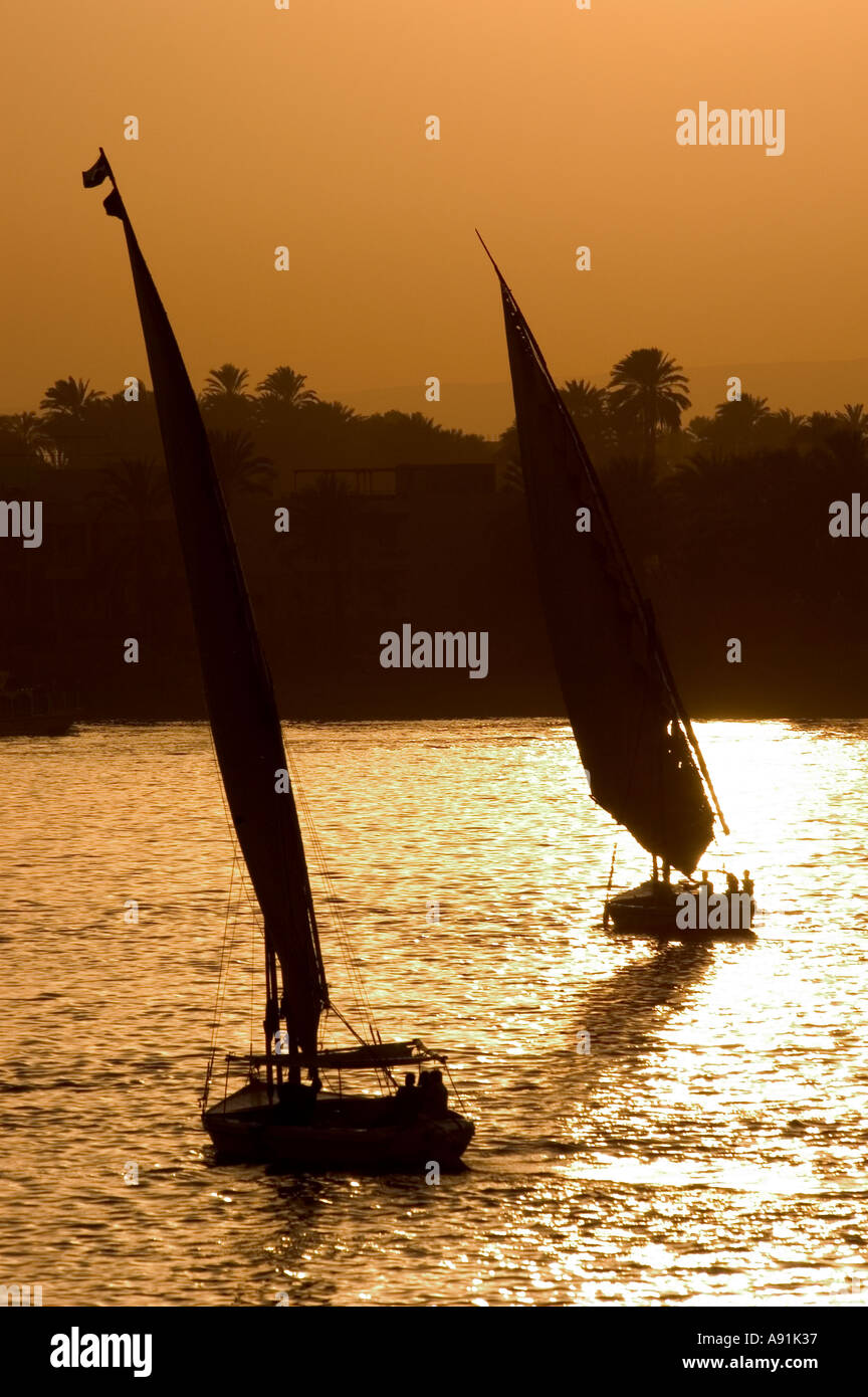 sunset felucca boats Nile River Luxor Upper Egypt Egypt North Africa ...