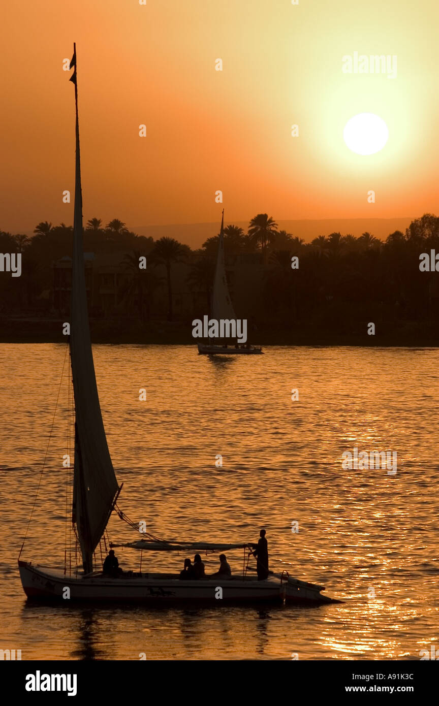 sunset felucca boats Nile River Luxor Upper Egypt Egypt North Africa ...