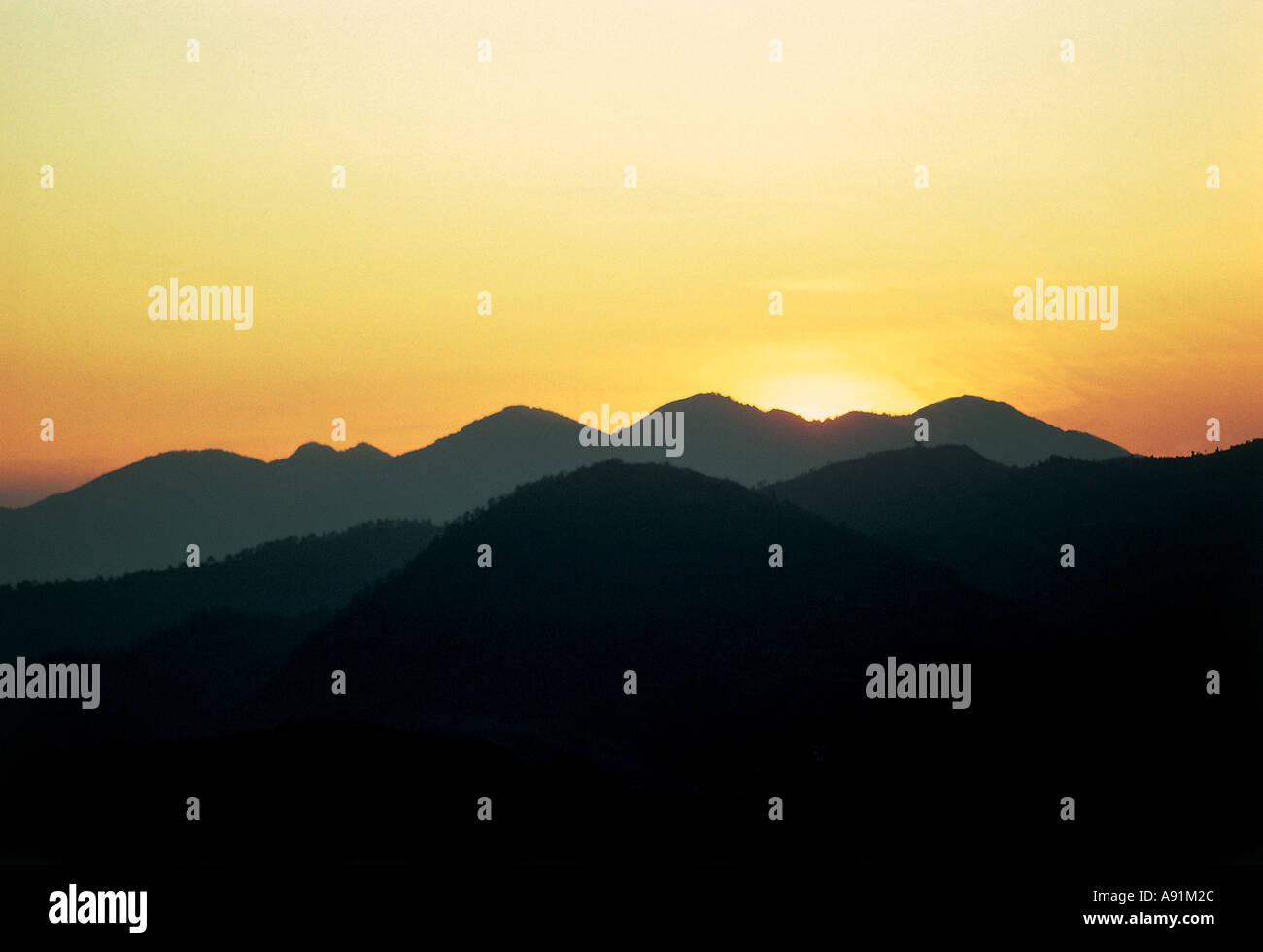 Sunrise with mountains hi-res stock photography and images - Alamy