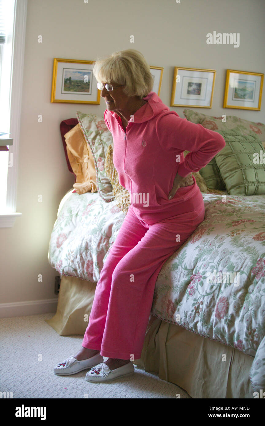 Senior Woman with Bad Back Stock Photo - Alamy